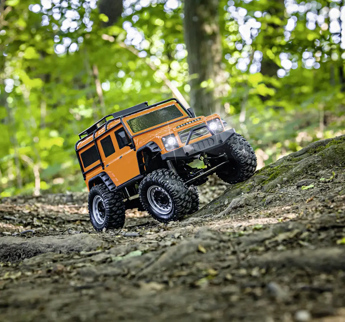 Carson 1:8 Land Rover Defender 100% RTR Orange, 14+